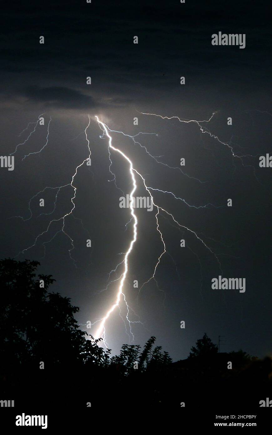 Lightning strikes during a thunderstorm Stock Photo - Alamy