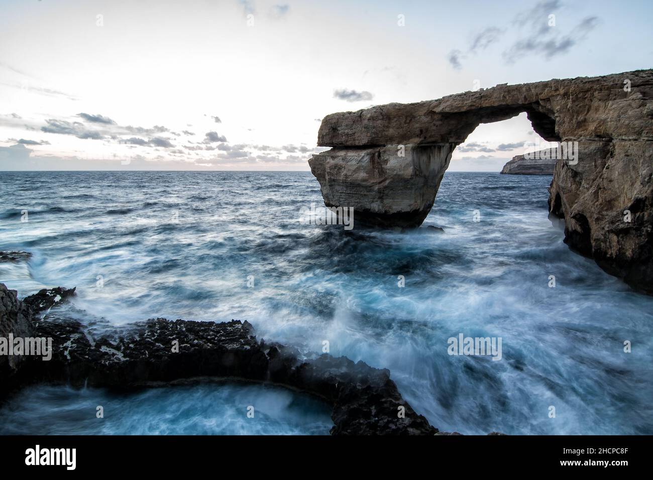 The stone arch of Gozo in Malta that has fallen a while ago Stock Photo ...