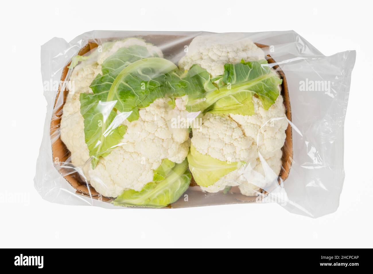 Packaged and labeled cauliflower on an isolated white background Stock ...
