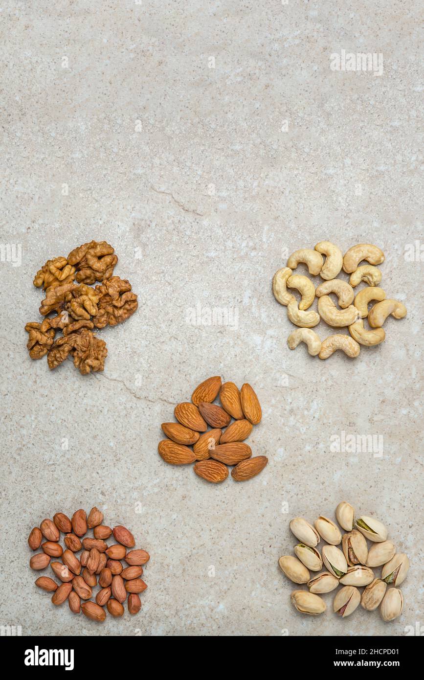 Nuts background, top view. The natural background is made from ...