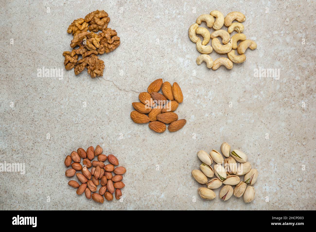 Nuts background, top view. The natural background is made from ...