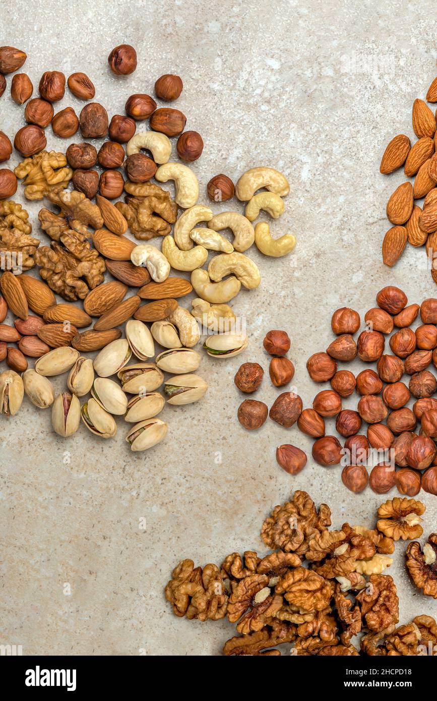 Nuts background, top view. The natural background is made from ...