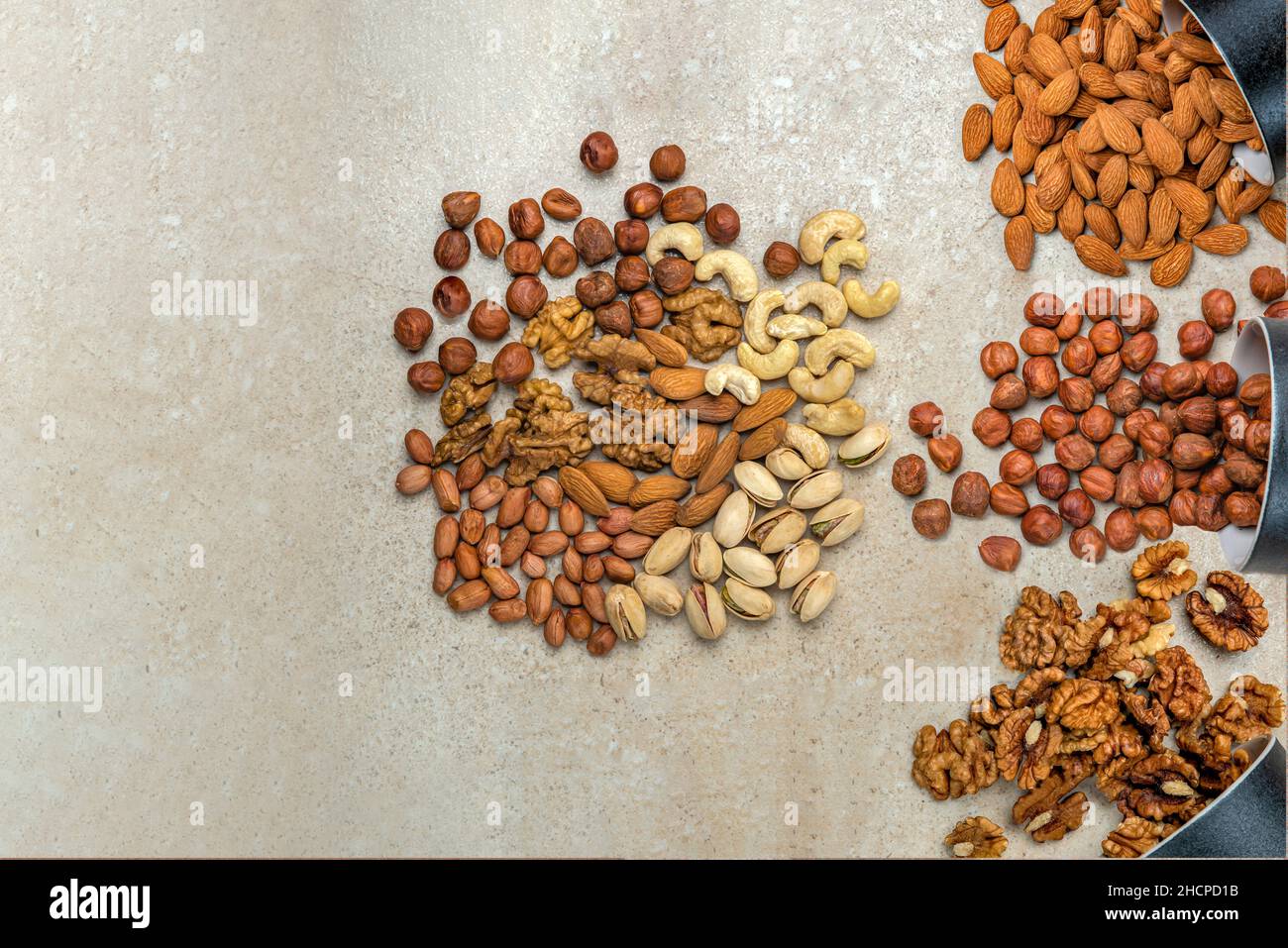 Nuts background, top view. The natural background is made from ...