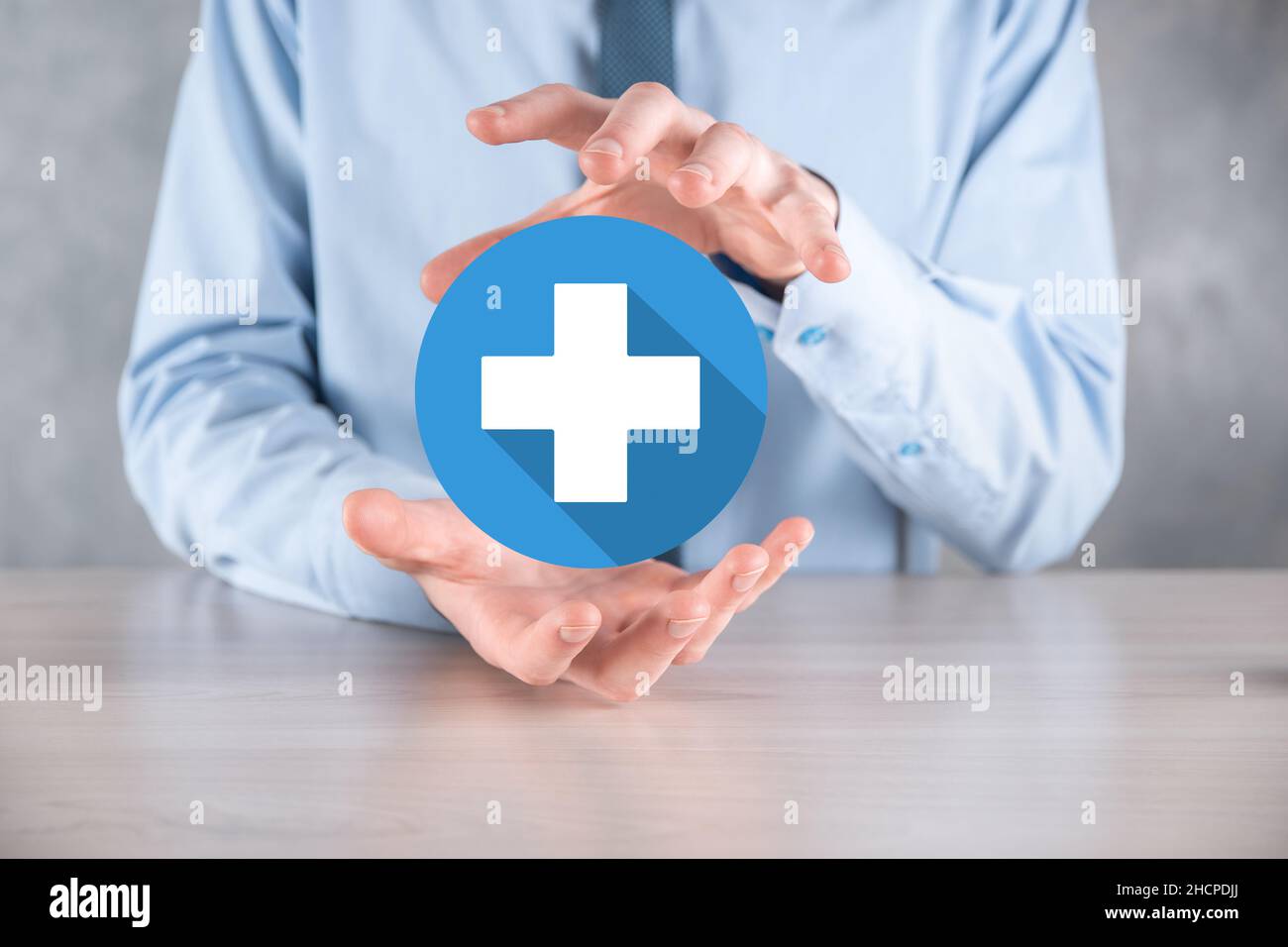 Businessman hold plus icon, man hold in hand offer positive thing such ...