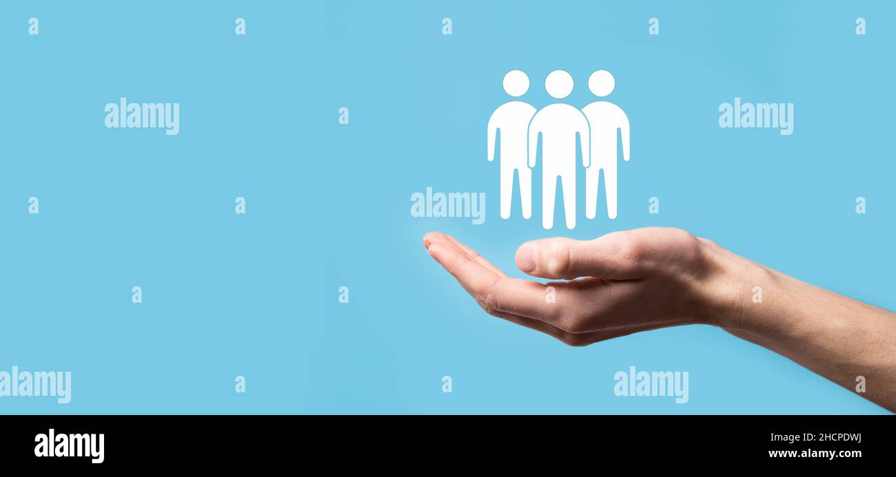 Businessman hold teamwork icon. Building a strong team. people icon ...