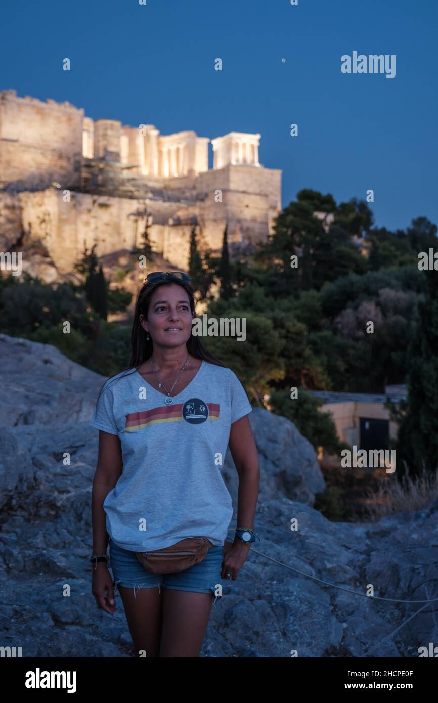 Woman in the Acropolis of Athens at sunset Stock Photo - Alamy