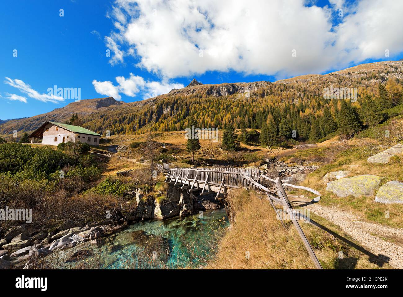 Adamello brenta park mountain hut in autumn hi-res stock photography ...