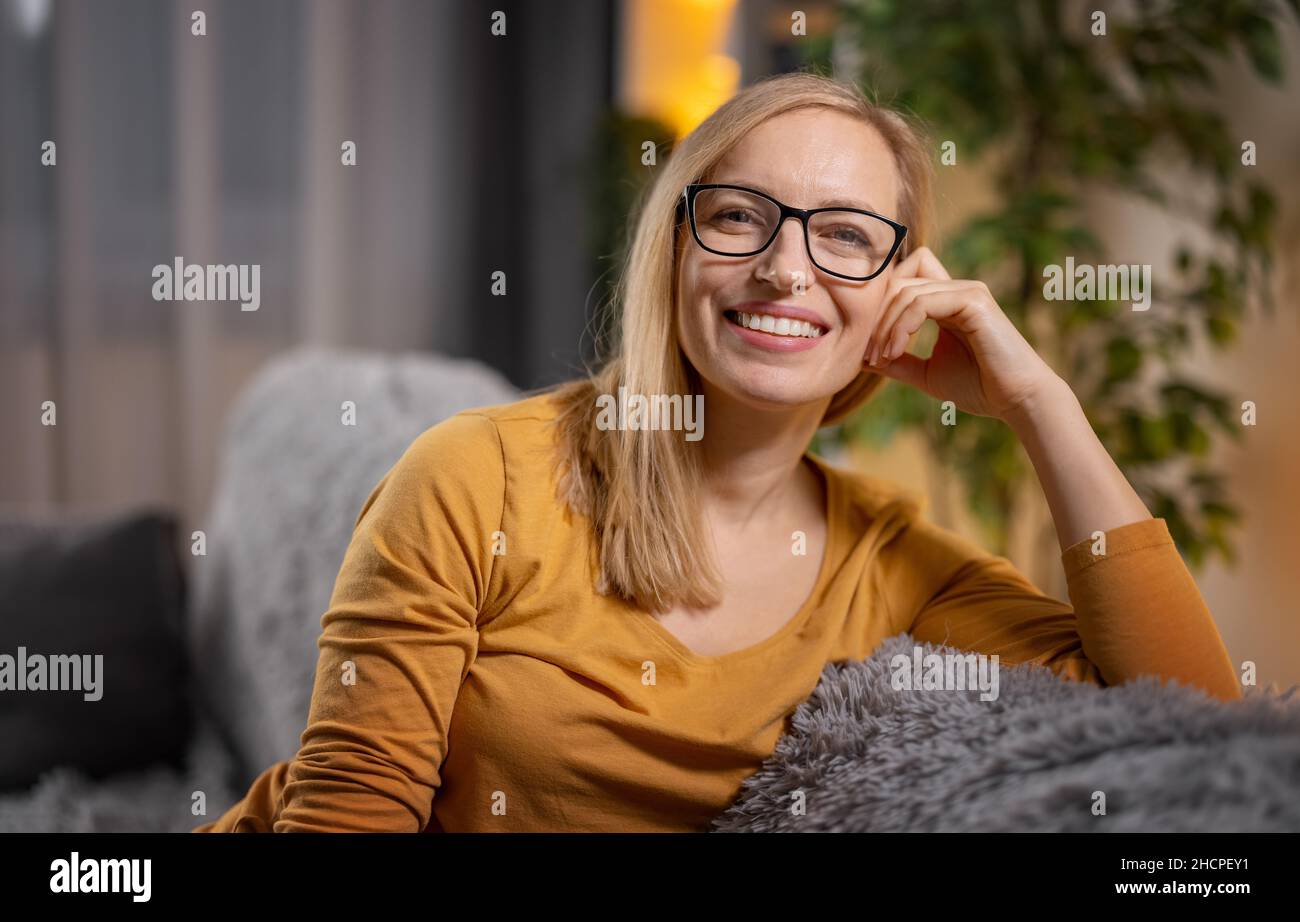 Portrait mature woman resting couch home hi-res stock photography and ...