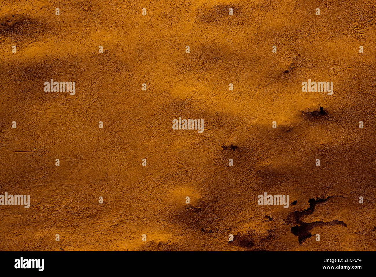 Copper colored wall texture background with textures of different ...