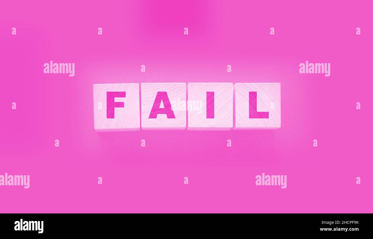 FAIL Word text Written In Wooden Cube blocks on black background ...