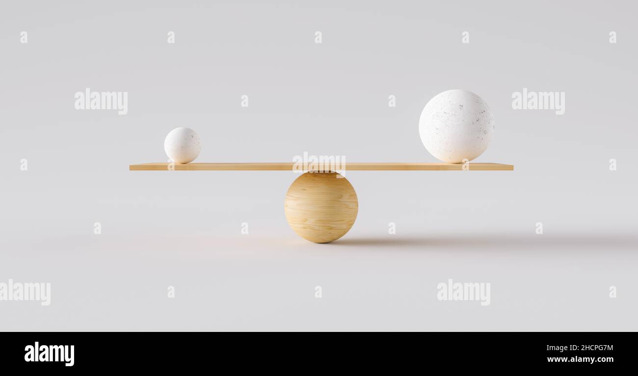 wooden scale balancing one big ball and one small ball. Concept of ...