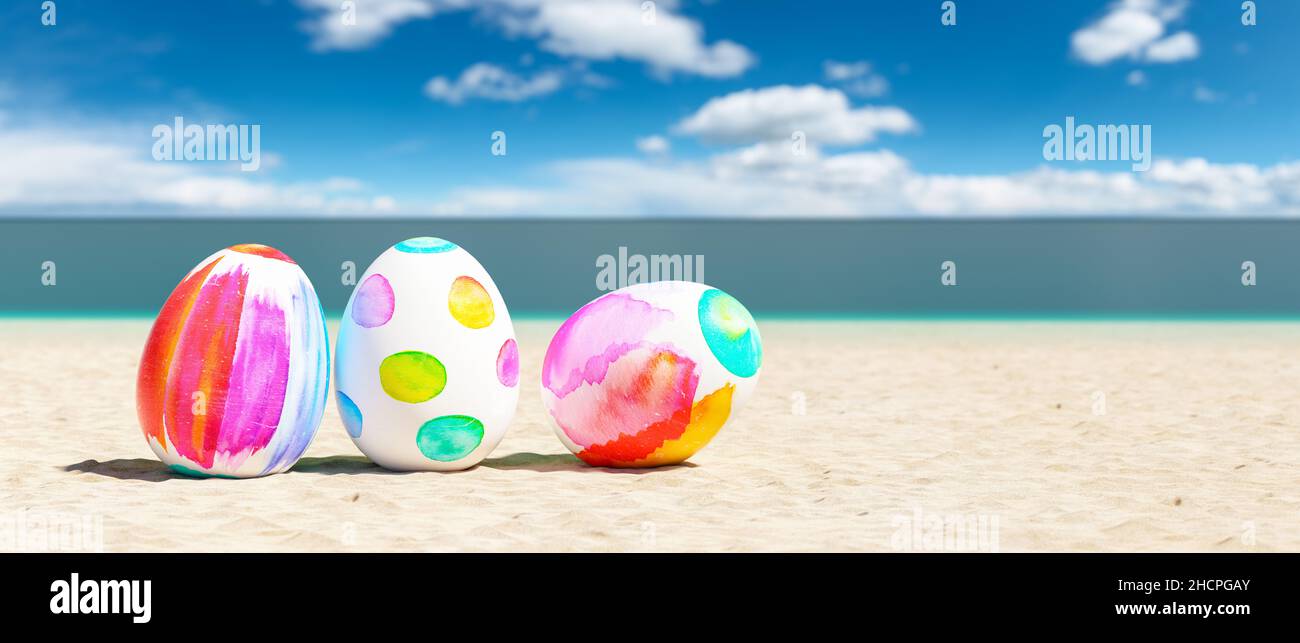 beach with colorful easter eggs during a easter vacation at the beach ...