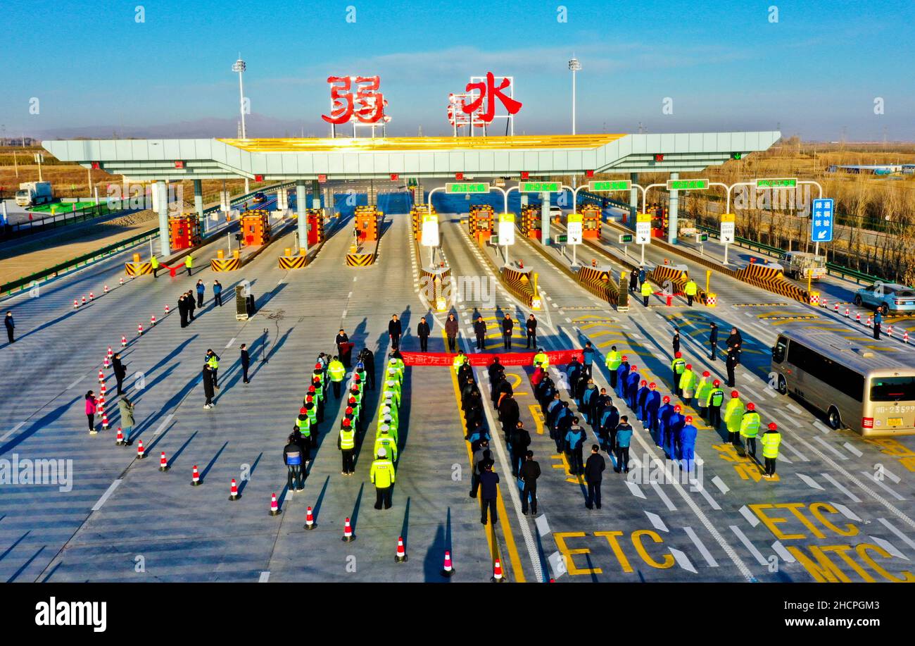 ZHANGYE, CHINA - DECEMBER 31, 2021 - The opening ceremony of the road ...