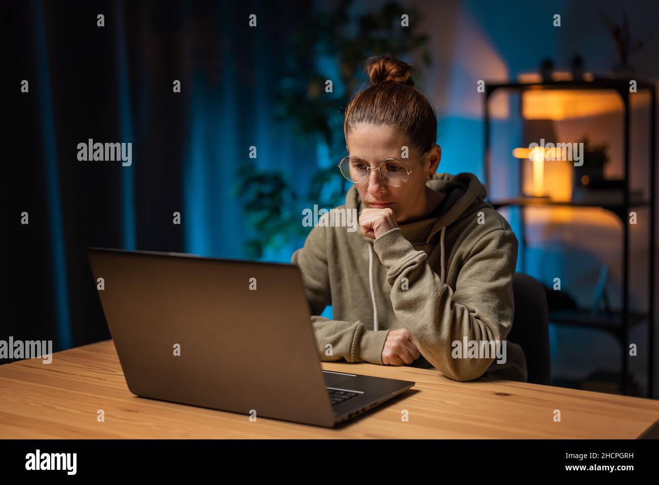 Woman working focused on laptop hi-res stock photography and images - Alamy