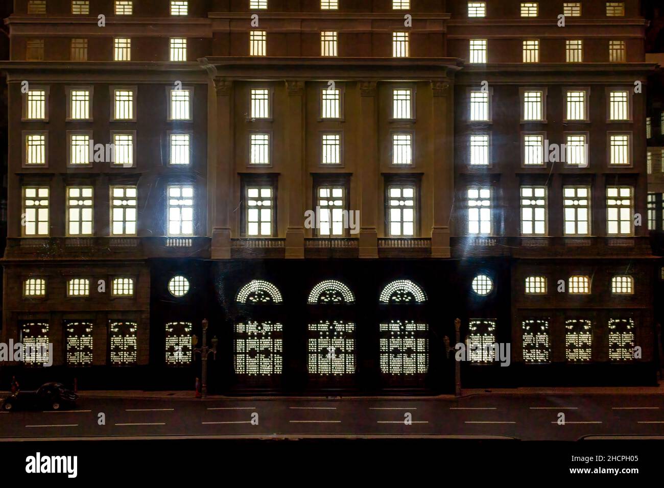 Pattern of windows in an old building facade at night.Dec. 31, 2021 ...