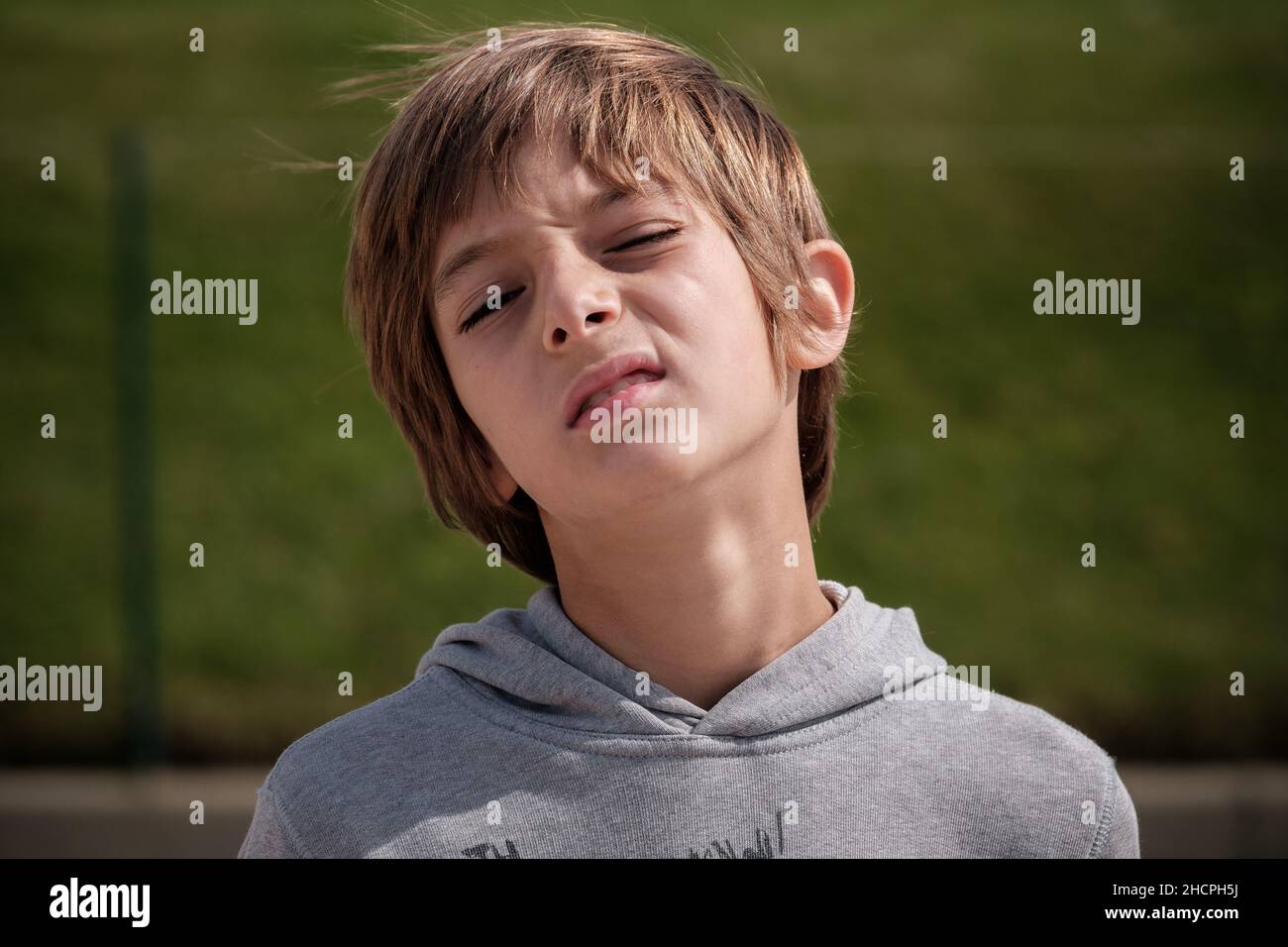 Children making different faces Stock Photo - Alamy