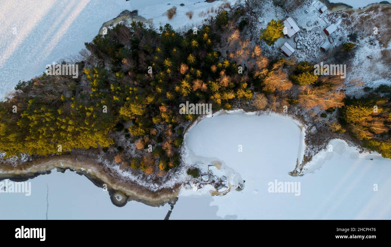 Aerial view of little Swedish village with islands and forests on a ...