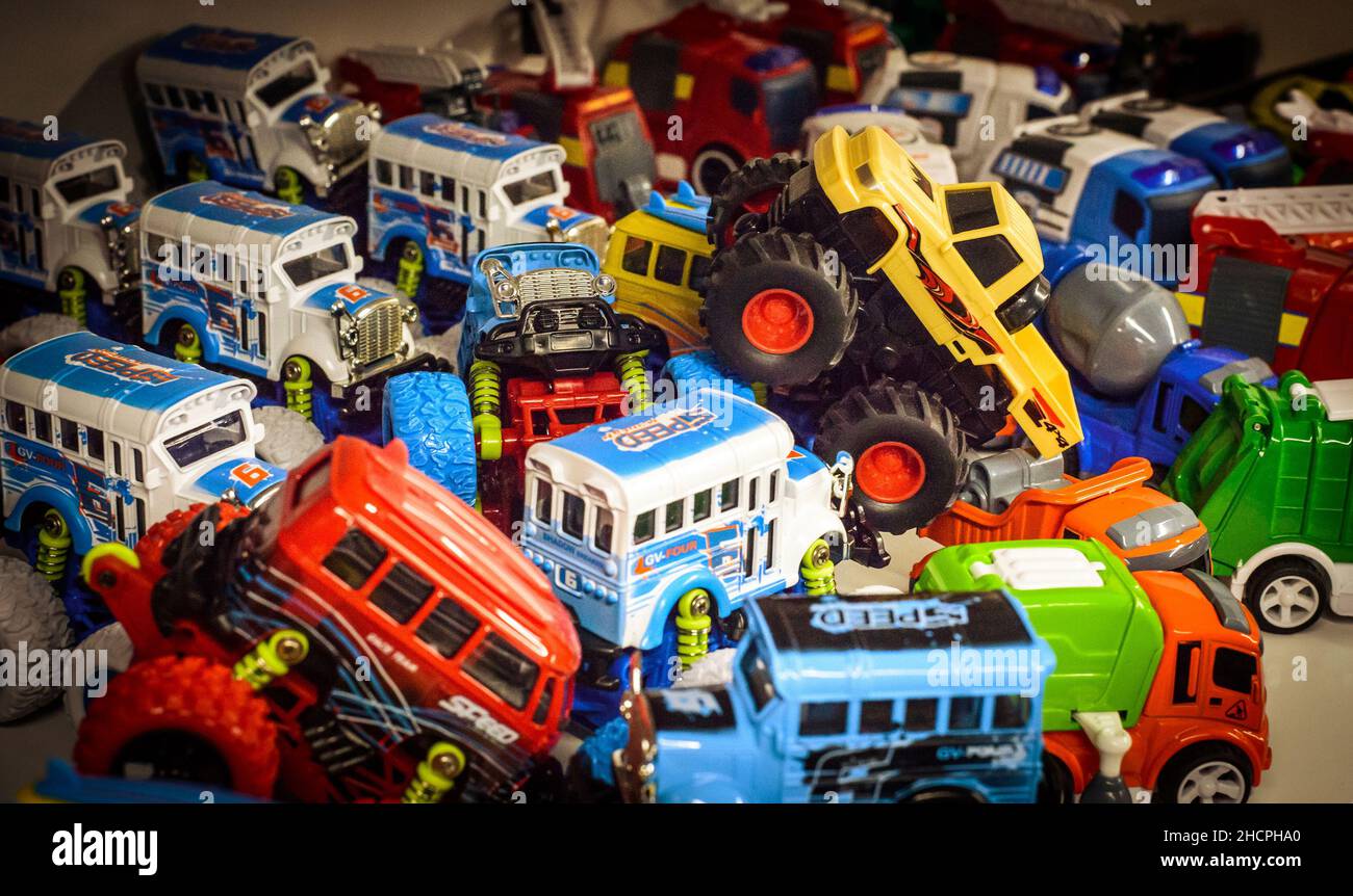 2021: chaotic pile of new toy trucks and buses, transport collapse ...