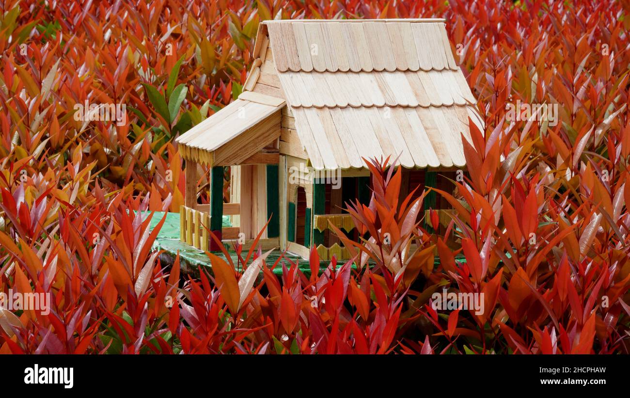 A traditional house made of pieces of wood as a miniature. Betawi ...