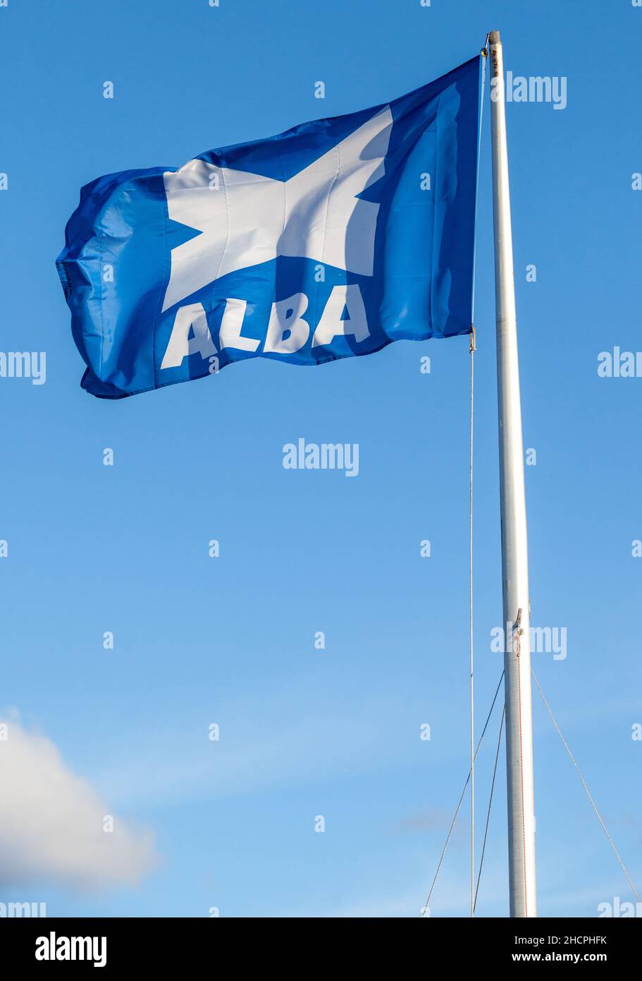 Scottish Alba Party flag flying against a blue sky Stock Photo - Alamy