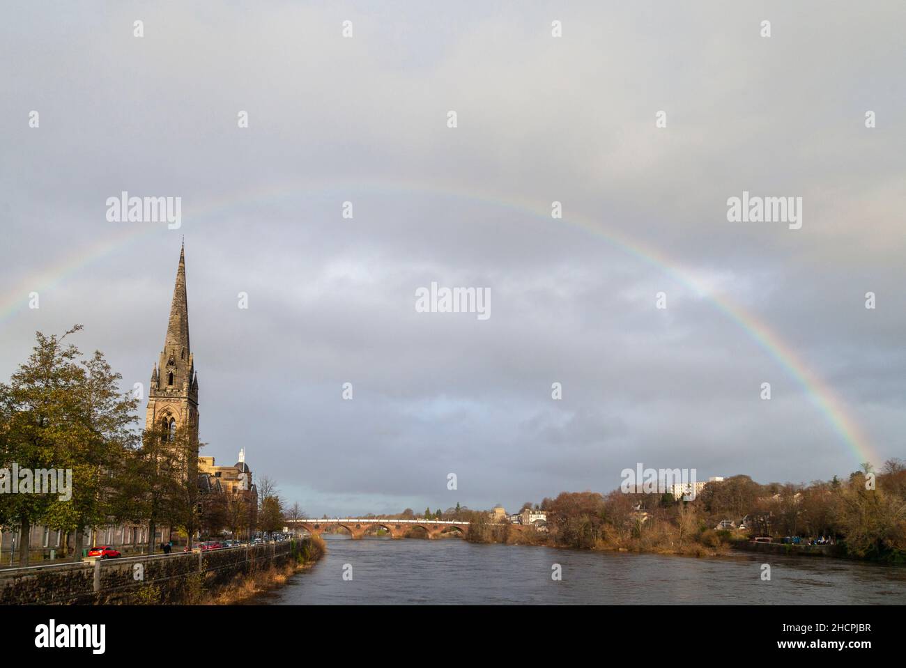 A rainbow and a view across River Tay to St Matthew's Church and ...