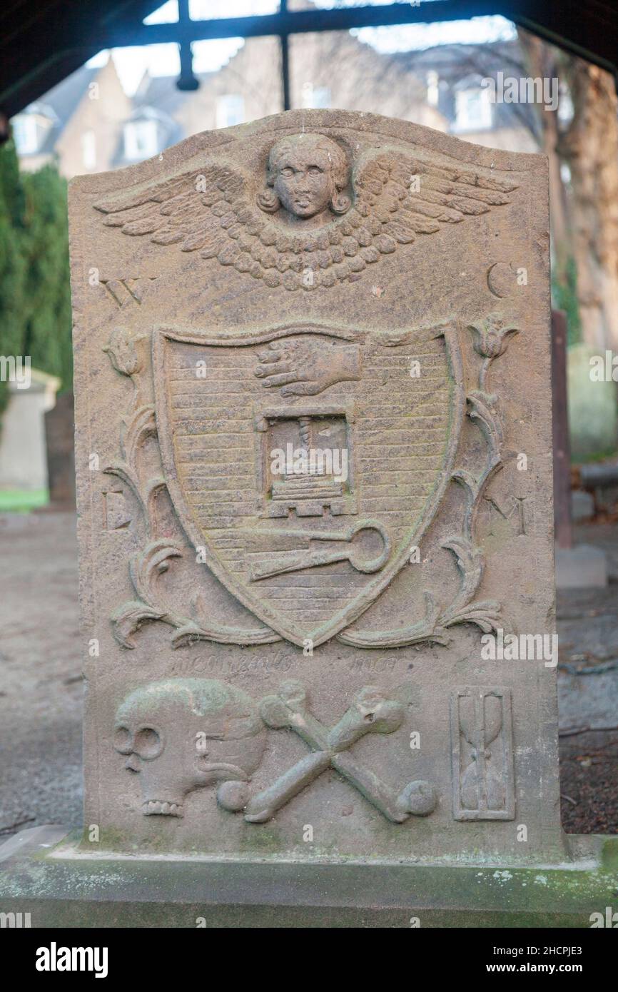 A highly detailed carving on an old headstone in Greyfriars Burial ...