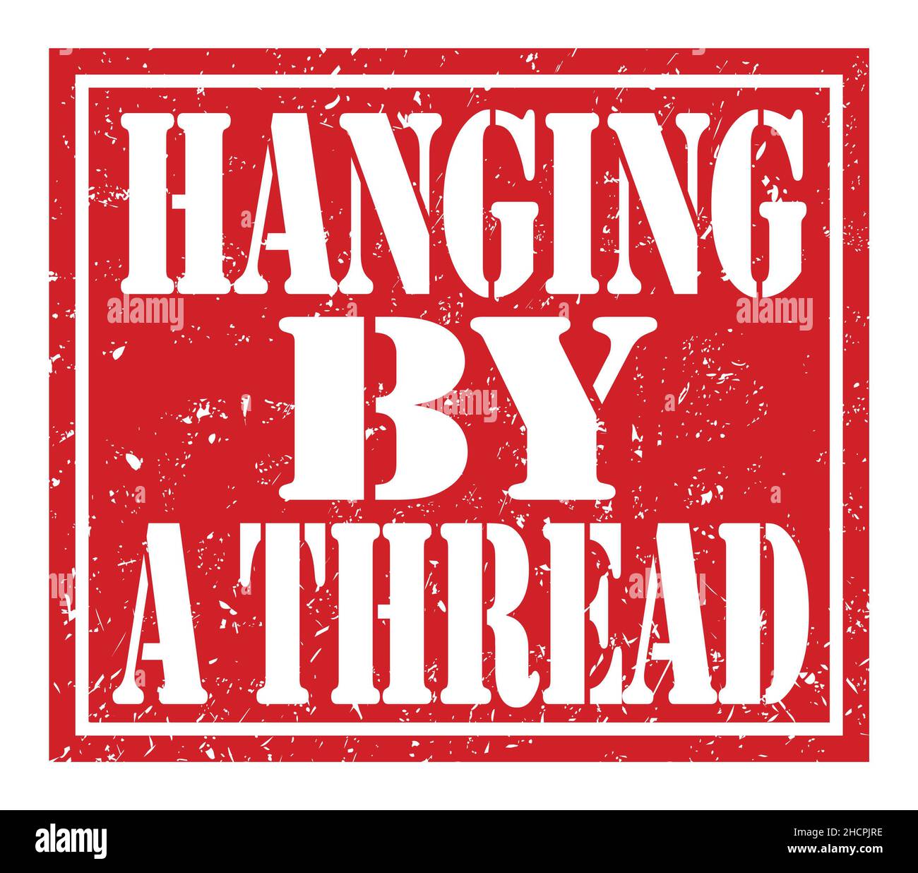 HANGING BY A THREAD, words written on red stamp sign Stock Photo - Alamy