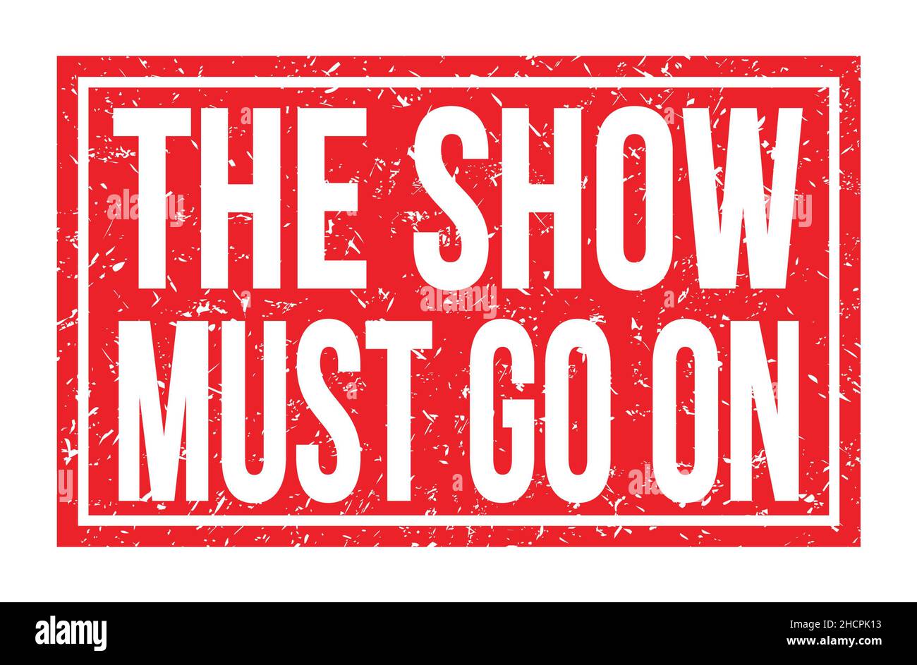 THE SHOW MUST GO ON, words written on red rectangle stamp sign Stock ...
