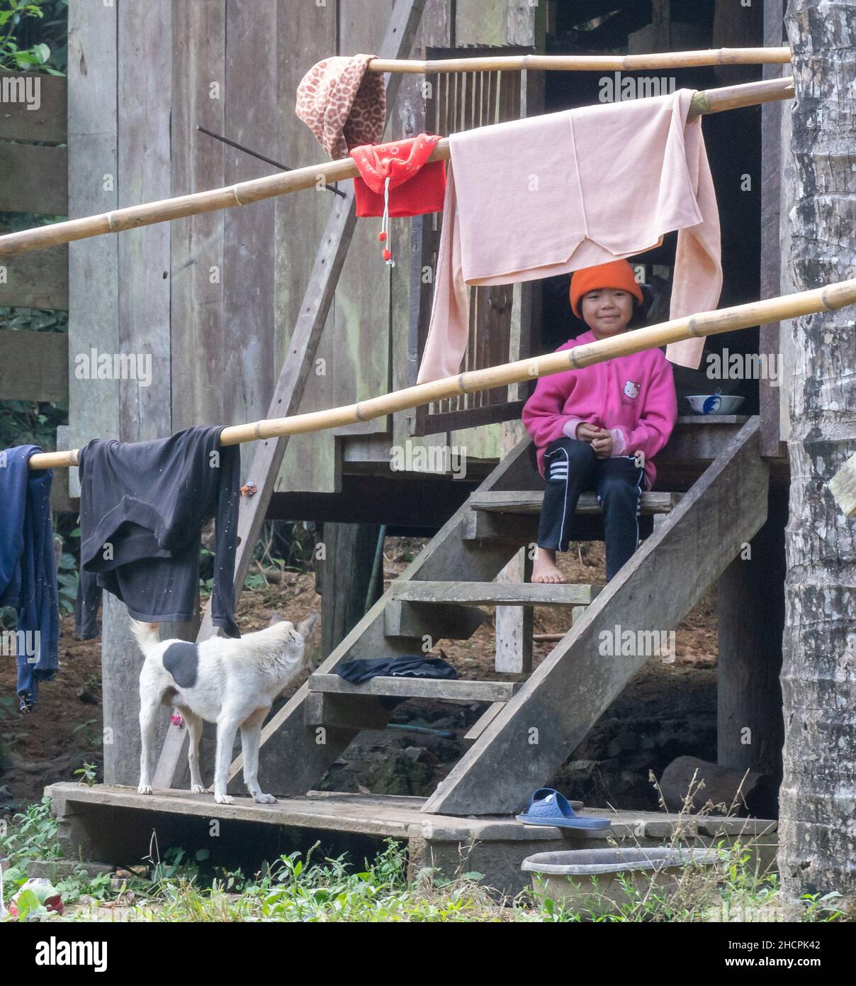 Child home sick from school in Huai Hillside Village, a Rural Northern ...