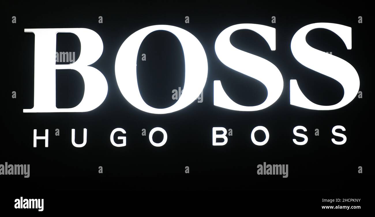 Milan, Italy - September 24, 2021: Hugo Boss logo displayed on a facade ...