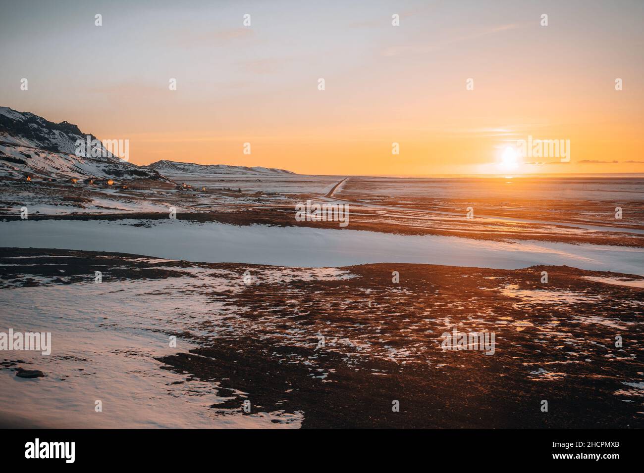 Sunset Sunrice over icelandic tundra with snow and ice Stock Photo - Alamy