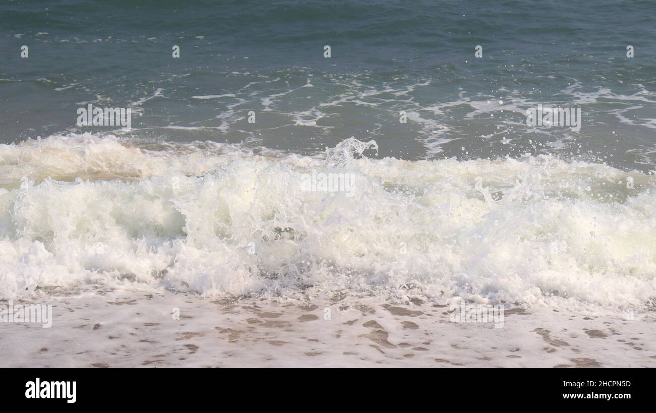 beautiful beach and sea waves and water droplets Stock Photo - Alamy
