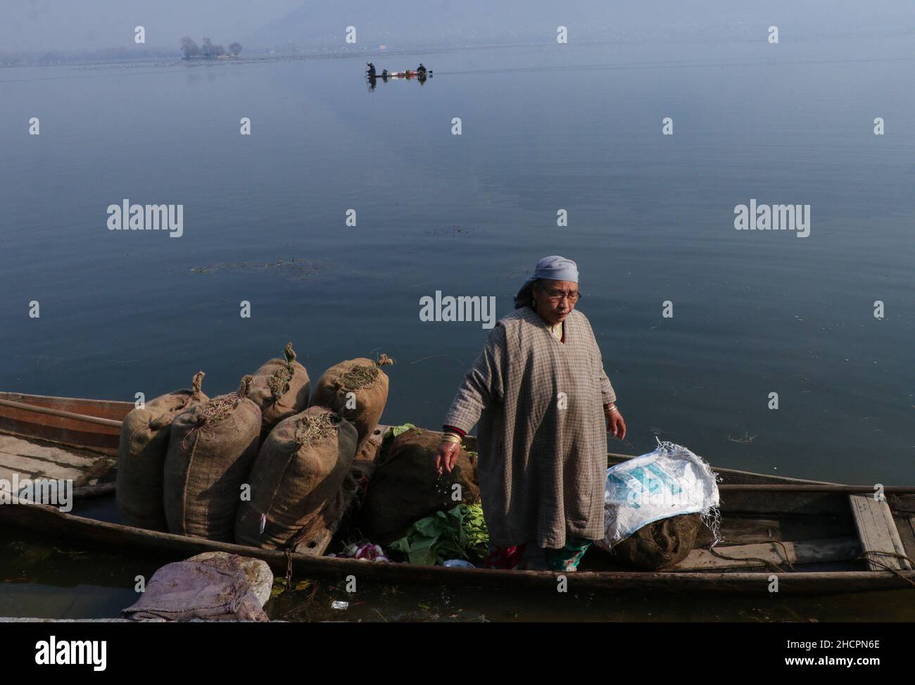 Srinagar, Jammu and Kashmir, India. 31st Dec, 2021. A woman selling ...
