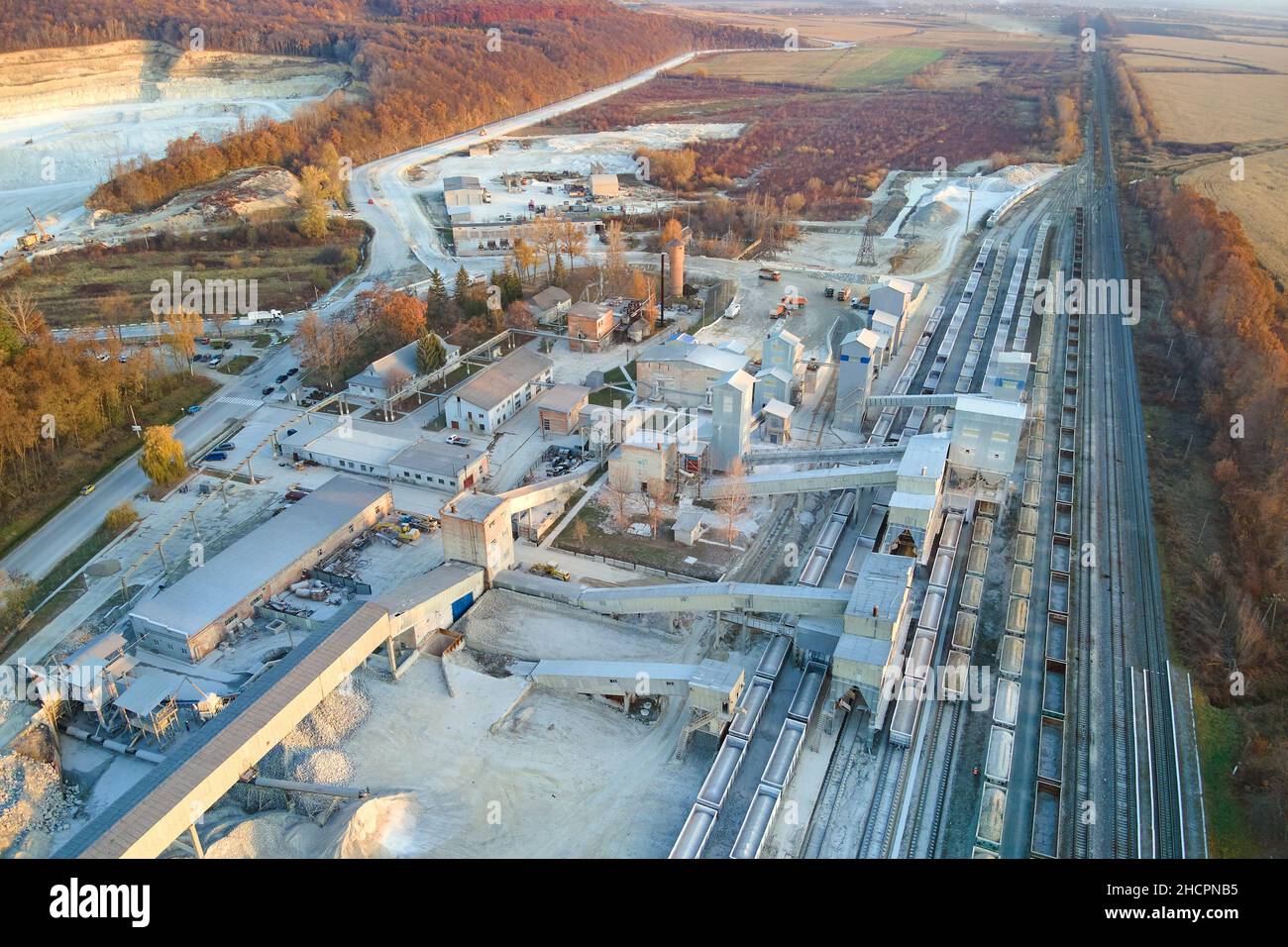 Aerial view of cargo train loaded with crushed sandstone materials at ...
