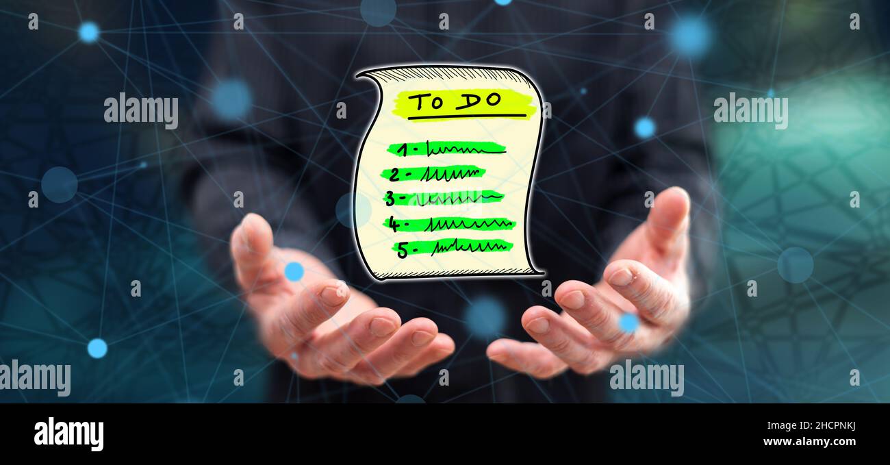 To do list concept above the hands of a man in background Stock Photo ...
