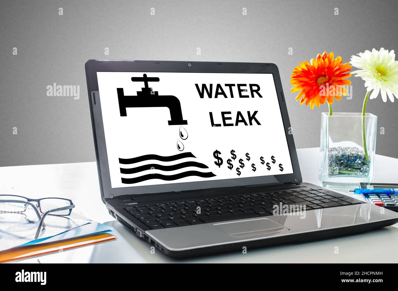 Laptop screen showing water leak concept Stock Photo - Alamy