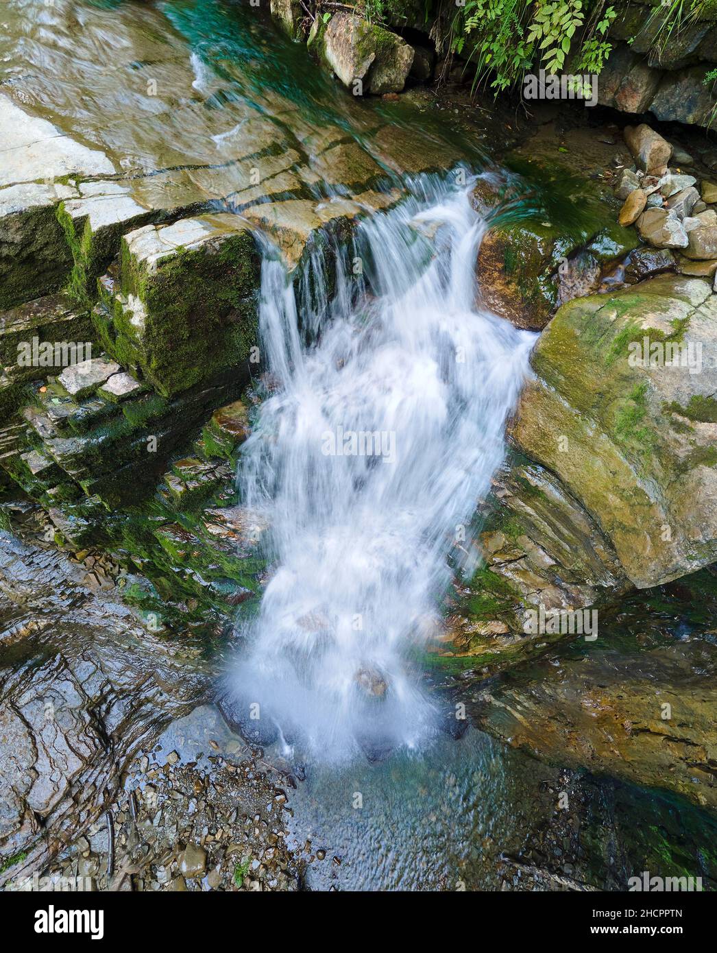 Amazing landscape of beautiful waterfall on mountain river with white ...