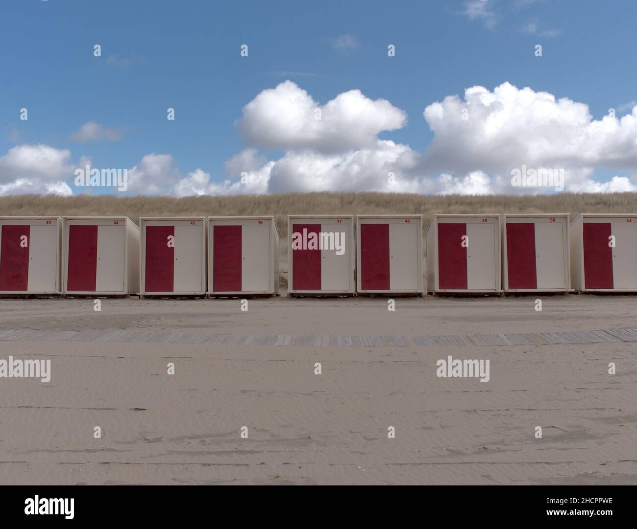 View of shelters on sand Stock Photo - Alamy