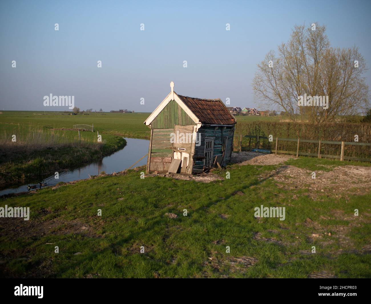 View of an old small rustic house in a village Stock Photo - Alamy
