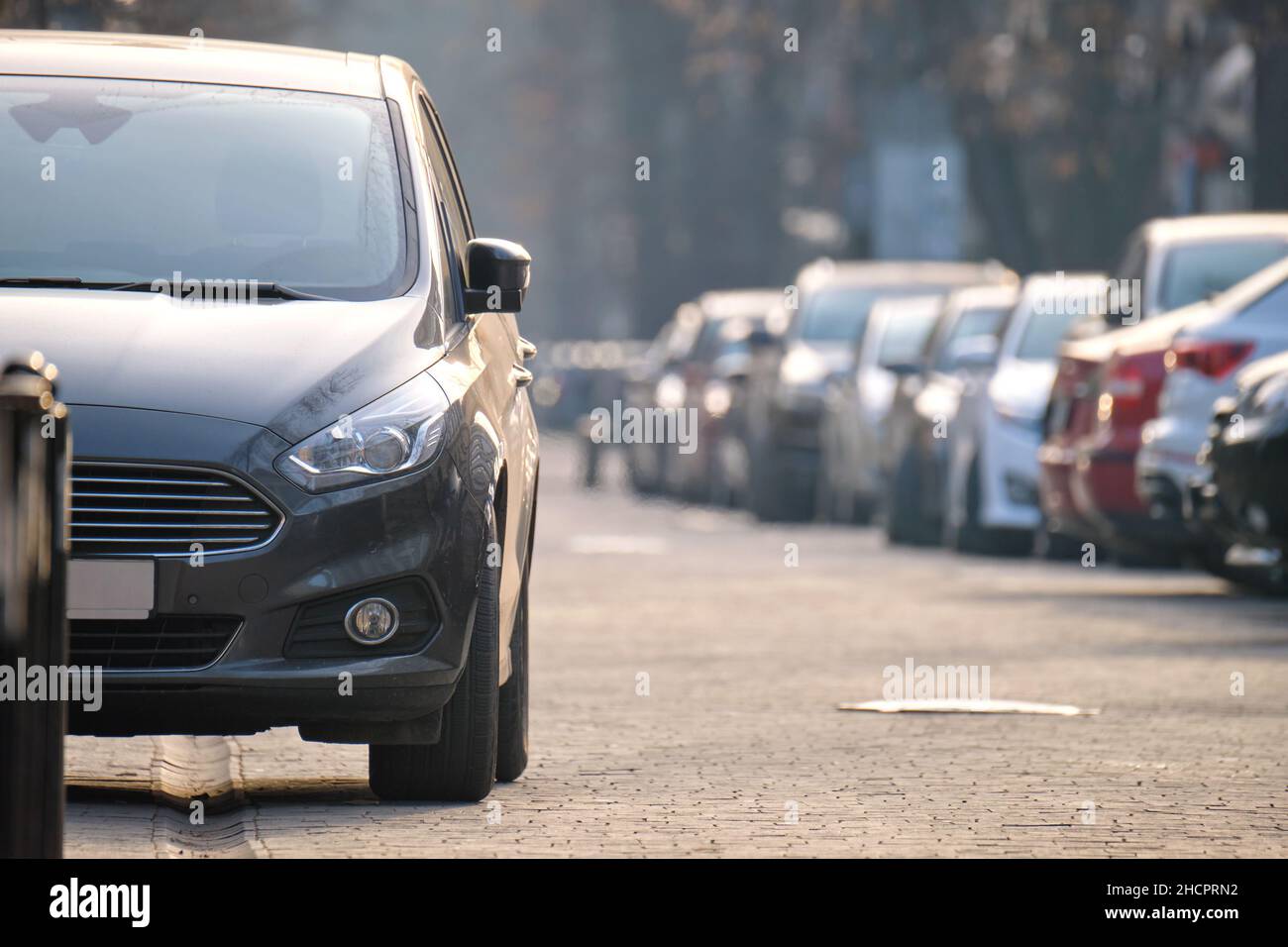 Close up of a car parked illegally against traffic rules on pedestrian ...