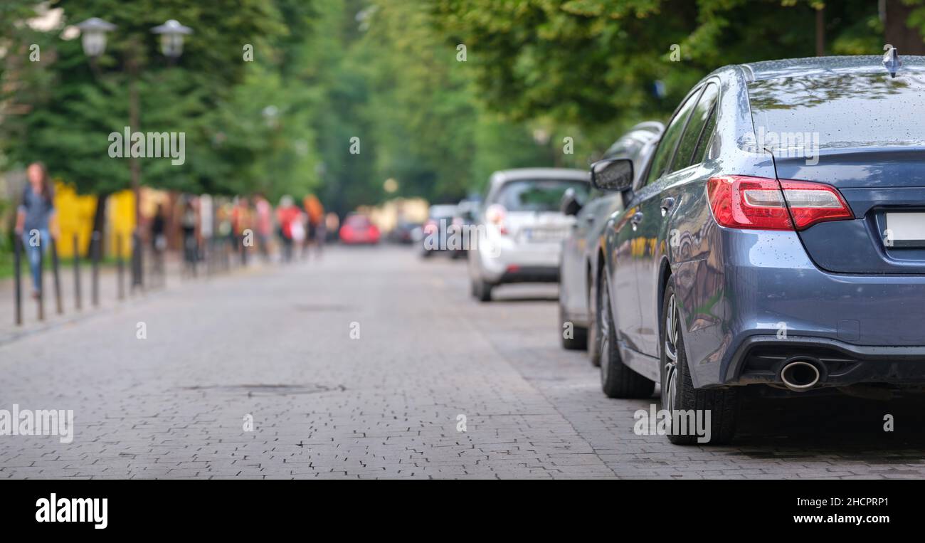 Close up of a car parked illegally against traffic rules on pedestrian ...