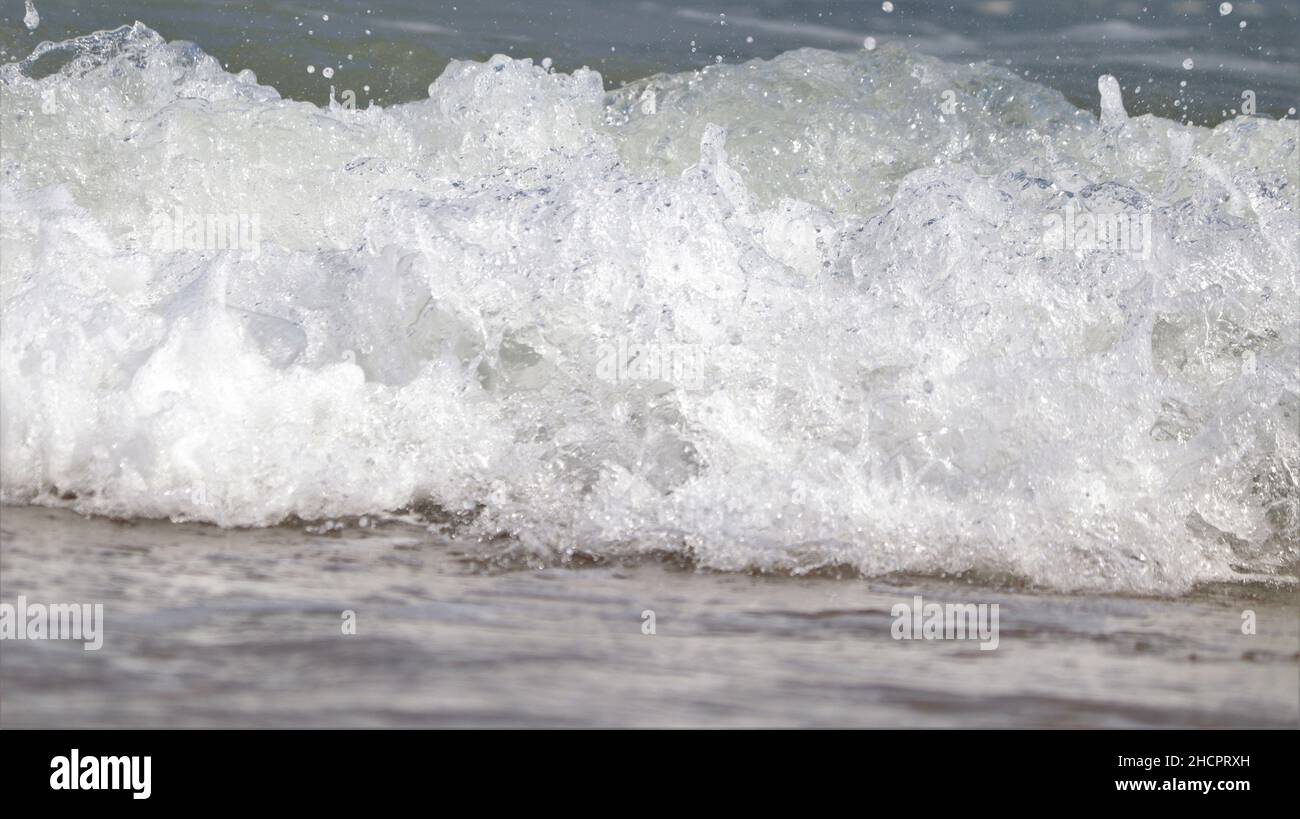beautiful beach and sea waves and water droplets Stock Photo - Alamy
