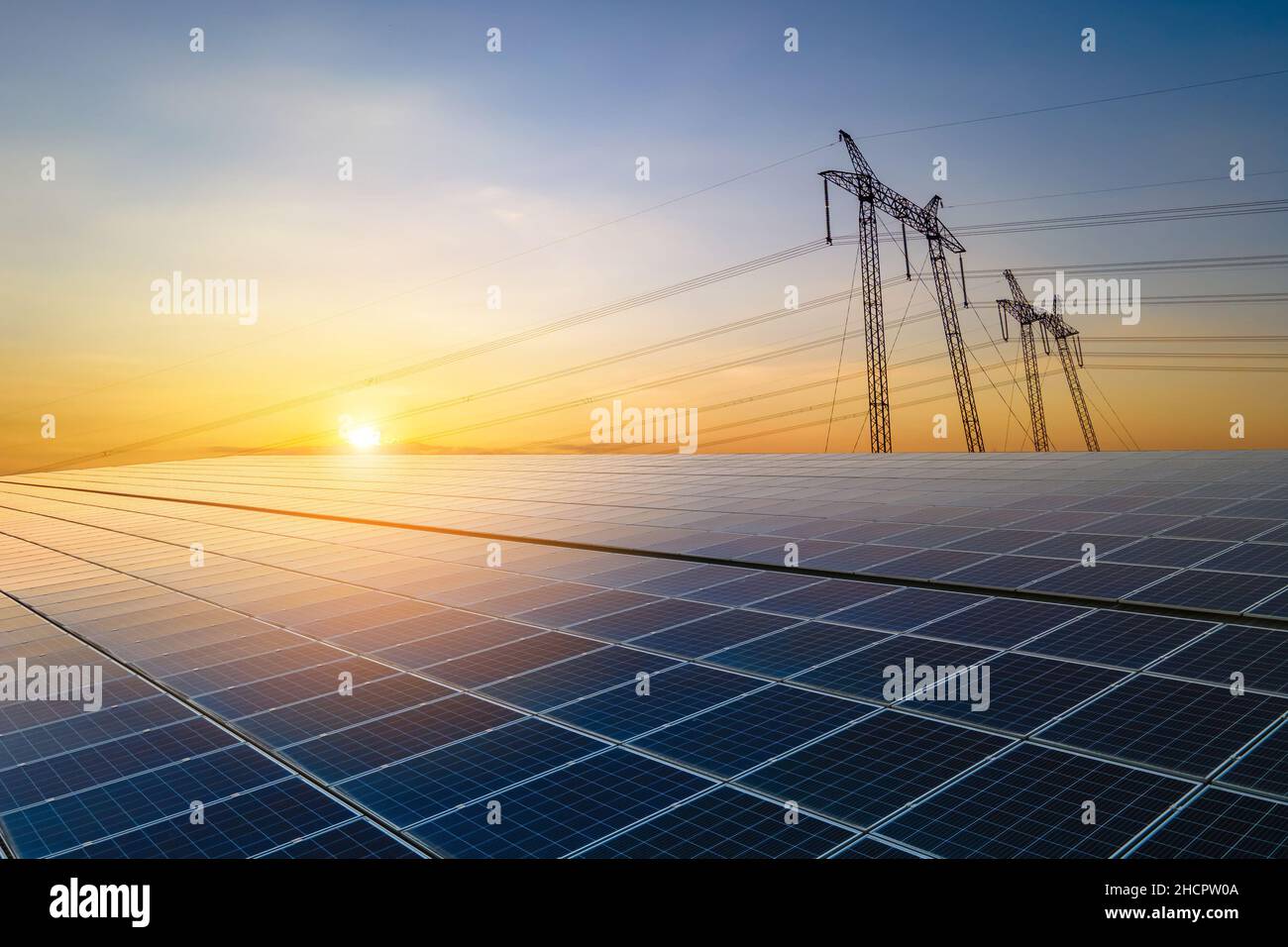 High voltage pylons with electric power lines transfering electricity ...