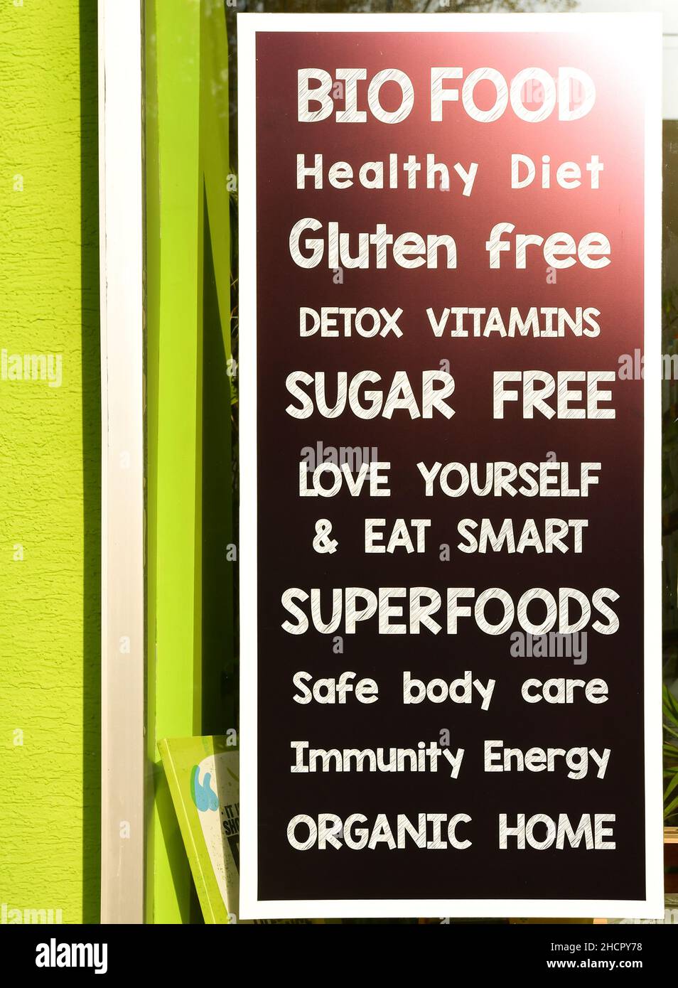 Billboard on healthy foods store facade with inspirational quotes ...