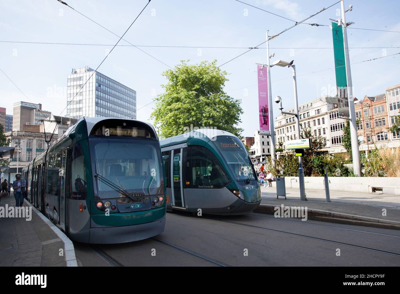 Two trams at Old Market Square in Nottingham in the UK Stock Photo - Alamy