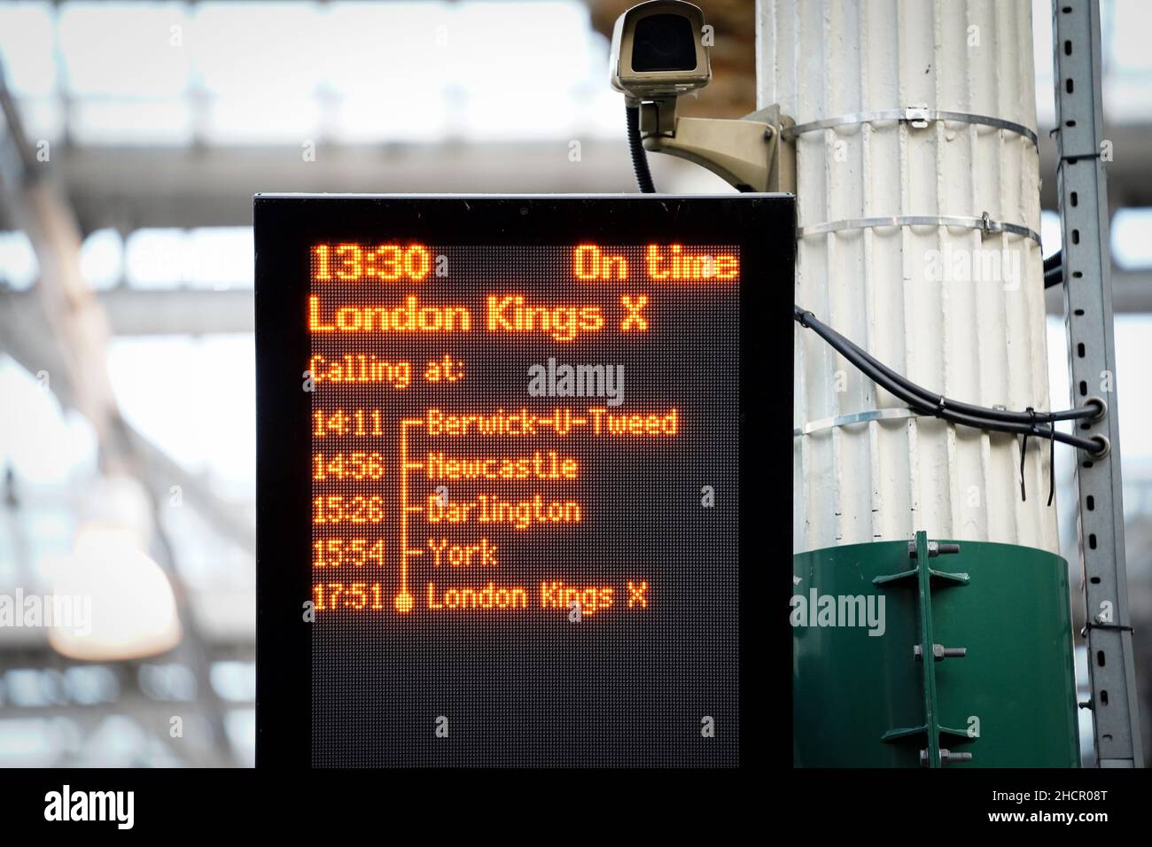 Platform information sign for the 13.30hrs Edinburgh to London Kings ...