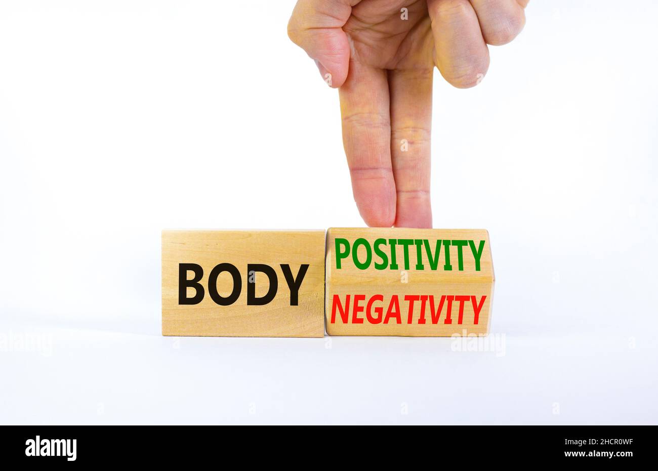Body positivity or negativity symbol. Psychologist turns cubes, changes ...