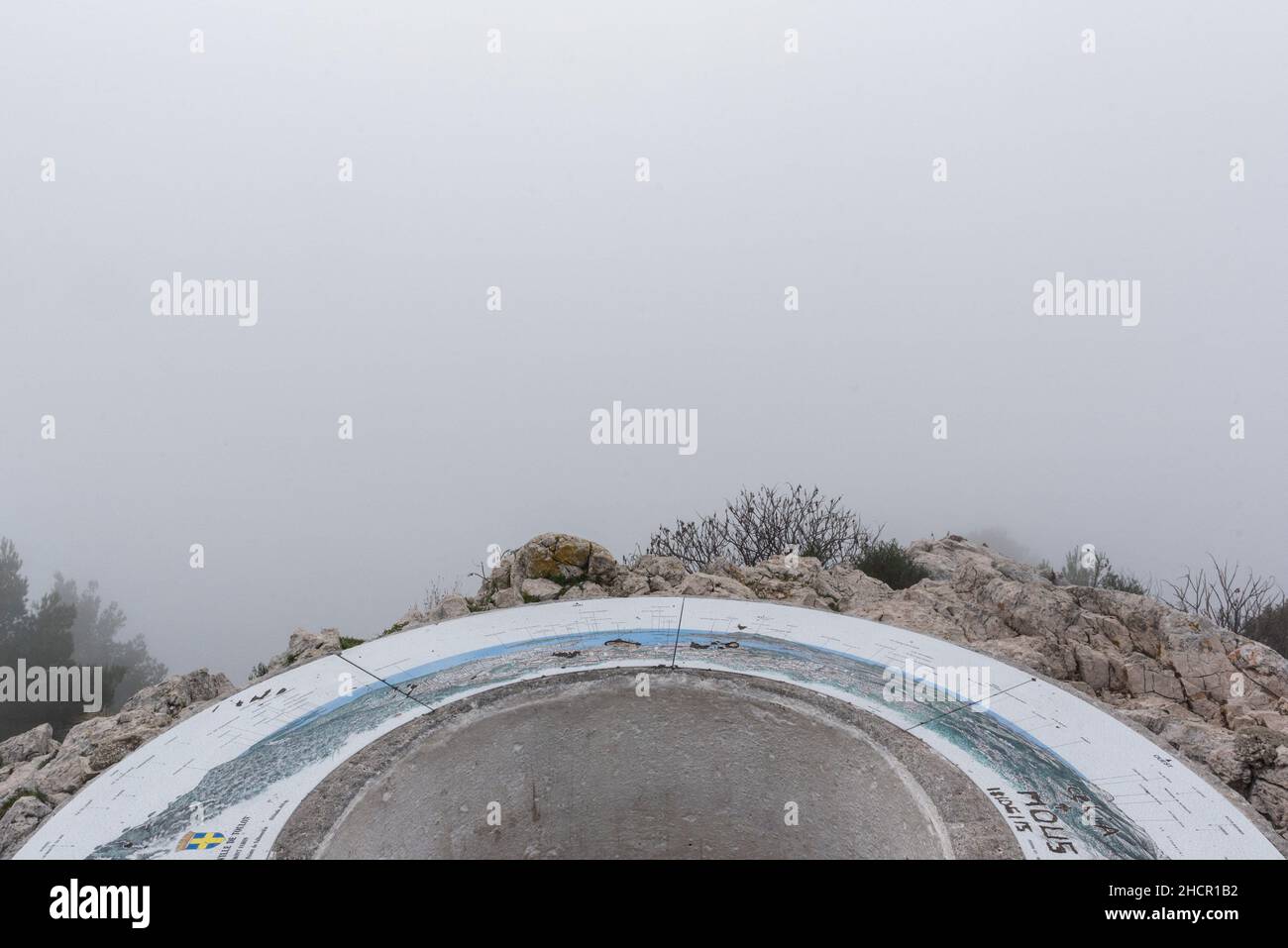 The fog has settled in the South of France. On the heights of Mont Faron, Toulon and its harbor ...