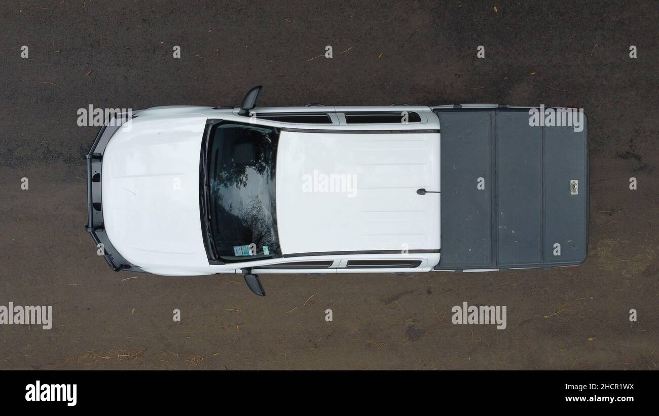 Aerial shot of an SUV on the road Stock Photo - Alamy
