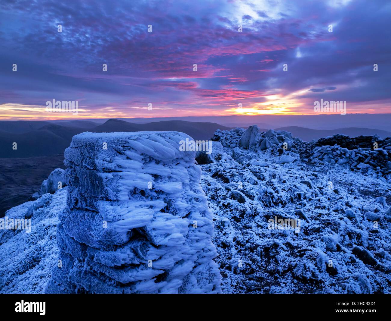 The summit of Red Screes covered by hoar frost at dawn Lake District UK ...